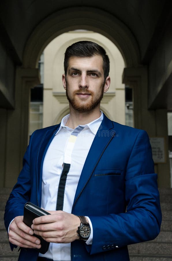 Handsome man in the jacket stock photo. Image of street - 75901440