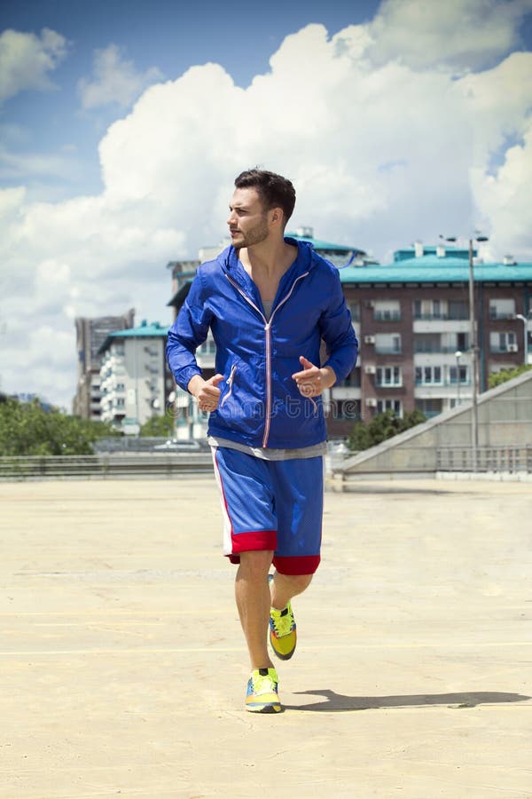 Handsome Man Jogging Outdoors Stock Image - Image of exercise, urban ...