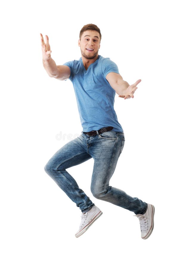 Handsome Man Jumping for Joy. Stock Image - Image of studio, cheerful ...