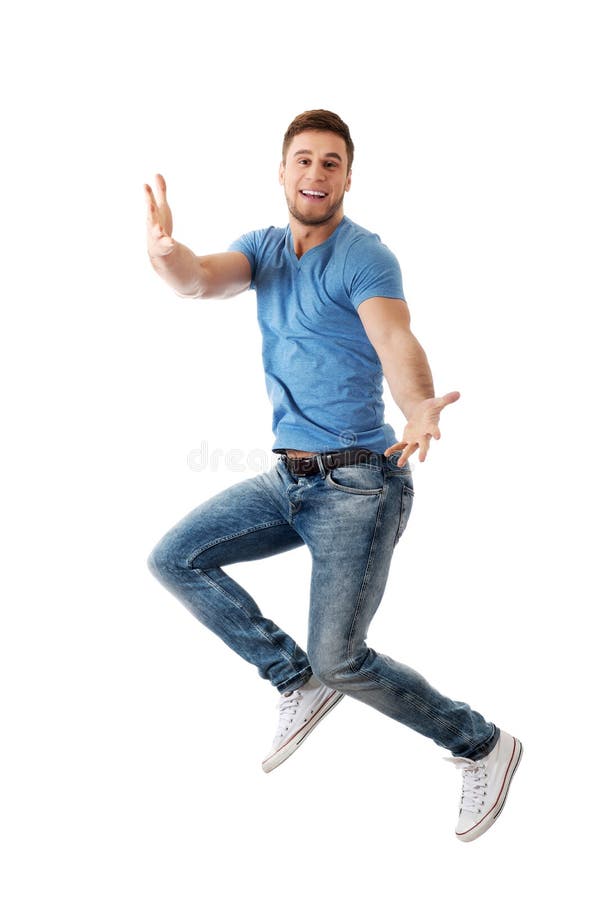 Handsome Man Jumping for Joy. Stock Image - Image of studio, cheerful ...
