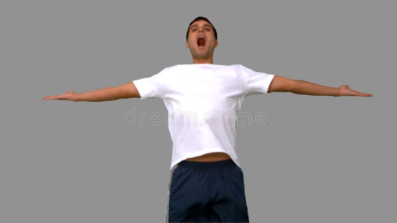 Handsome Man Jumping and Raising Arms on Green Screen Stock Footage ...