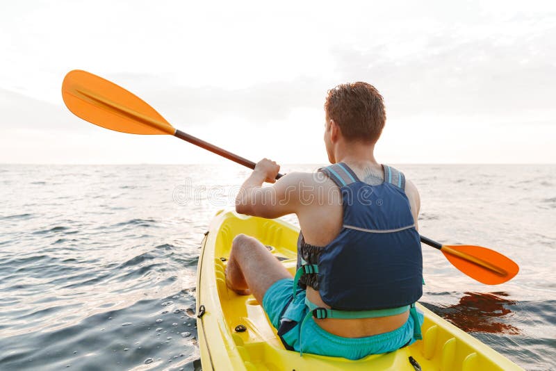 Handsome Man Kayaking on Lake Sea in Boat. Stock Image - Image of ...