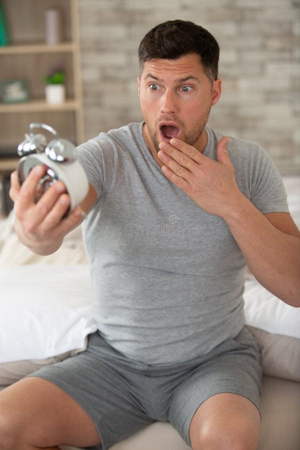 Handsome man late for work stock image. Image of counter - 309327393