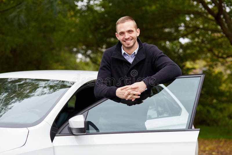 Happy Man Leaning on His Hand Working in Office Stock Image - Image of ...