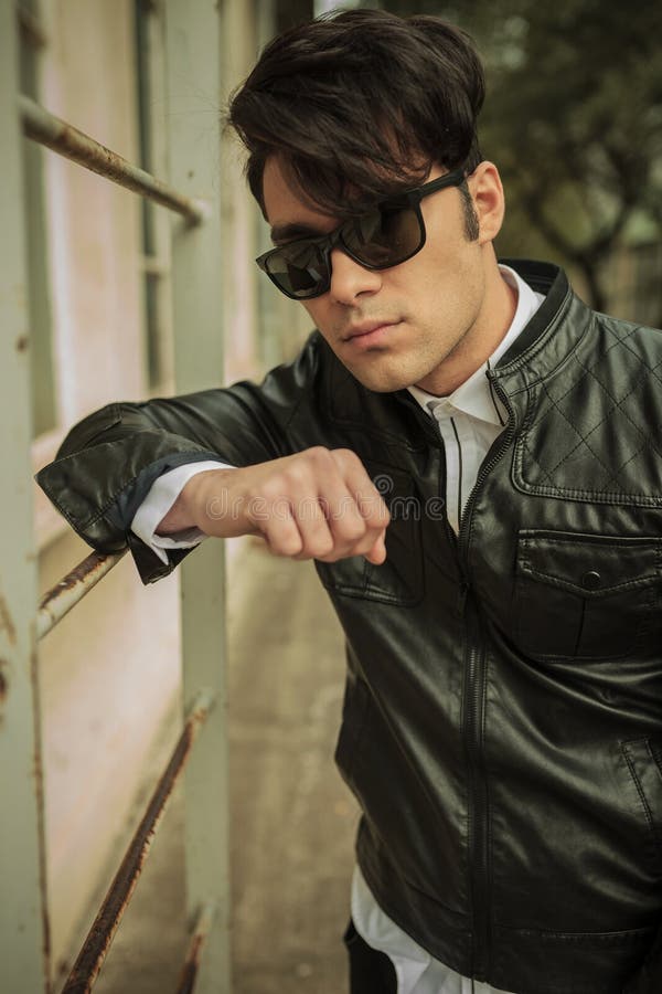 Handsome Man Leaning on a Ladder Stock Image - Image of modern, dude ...