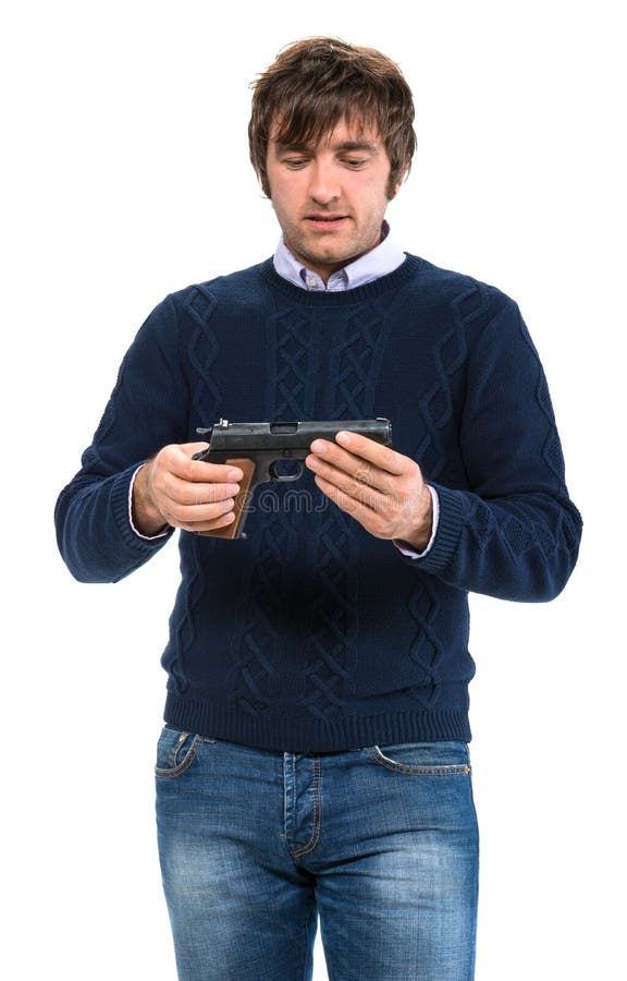 Handsome Man Looking at Gun Stock Photo - Image of firearm, handsome ...