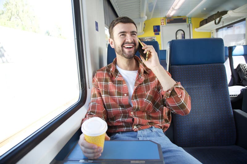 Handsome Man Making a Call from a Train Stock Image - Image of ...