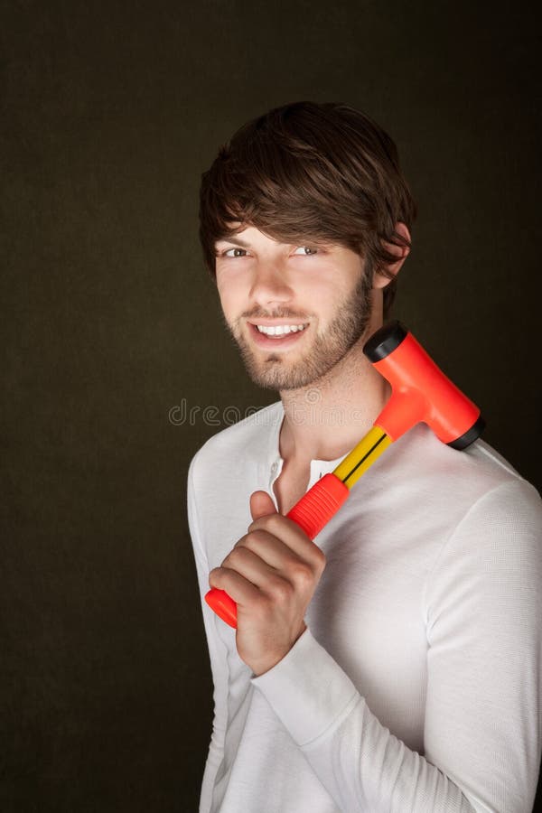 Handsome Man with Mallet stock image. Image of happy - 19359633