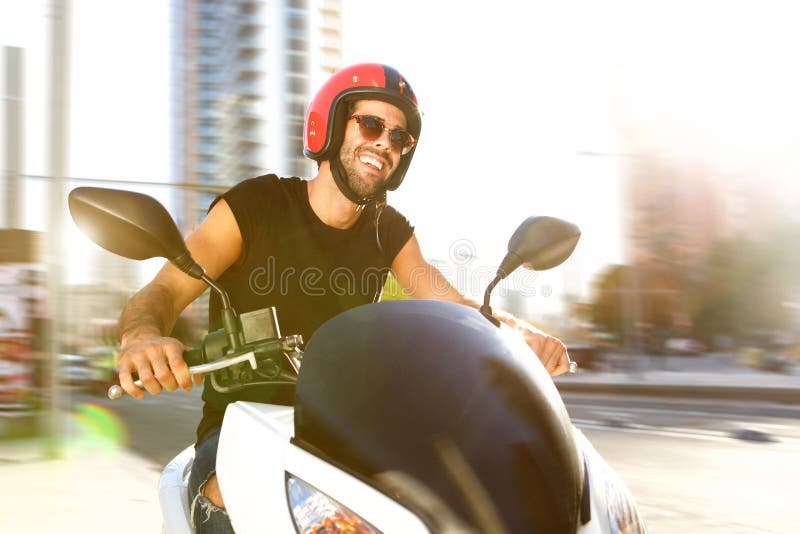 Handsome Man on Motorcycle Ride in City Smiling Stock Photo - Image of ...