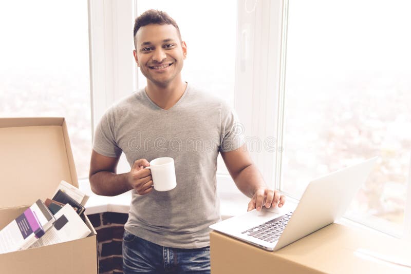 Handsome man moving stock photo. Image of american, property - 80992244