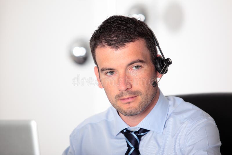 Handsome man in office stock photo. Image of businessman - 25718102