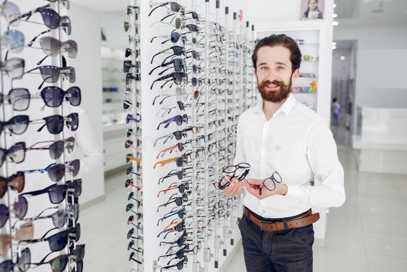 Handsome Man in a Optics Shop Stock Image - Image of medicine, optician ...