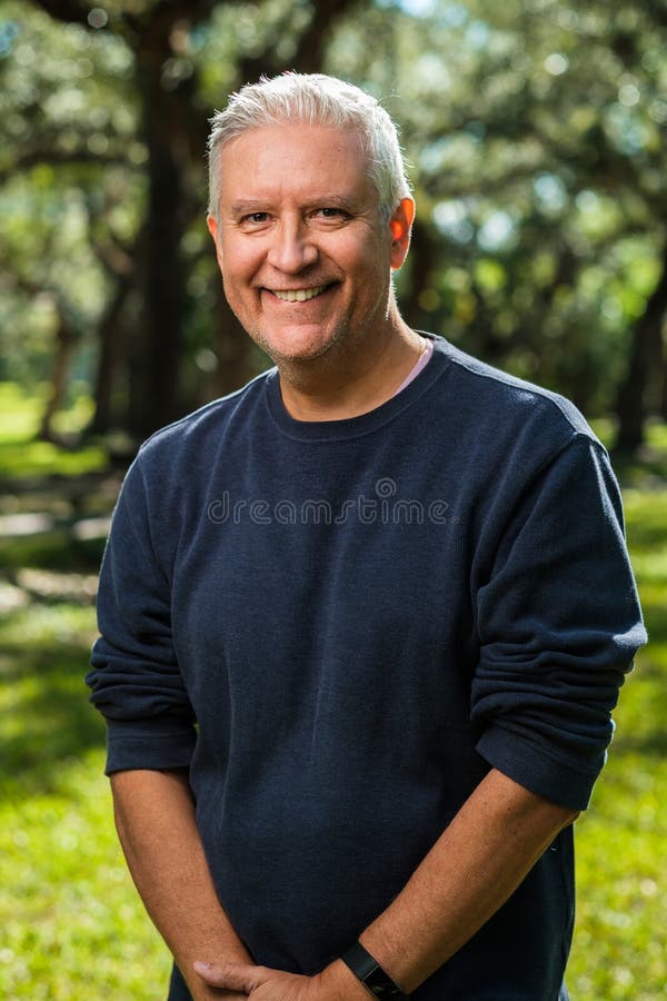 Handsome man outdoors stock image. Image of green, latino - 134172621