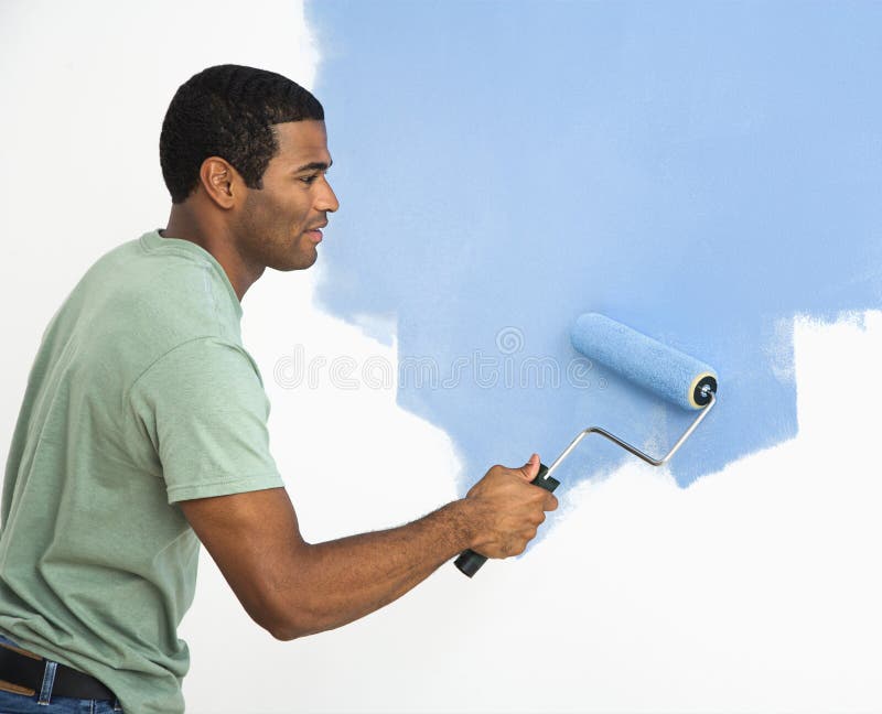 Handsome Man Painting Wall. Stock Image - Image of photograph, blue ...
