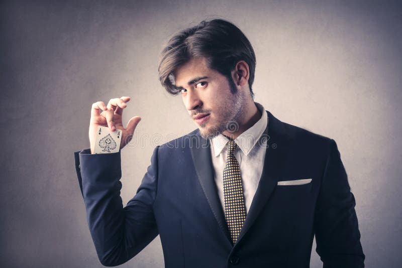 Handsome man playing cards stock image. Image of winning - 46718337