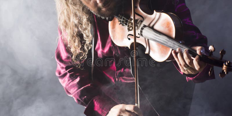 Handsome Man Playing Classical Violin in Blue Smoke Stock Image - Image ...