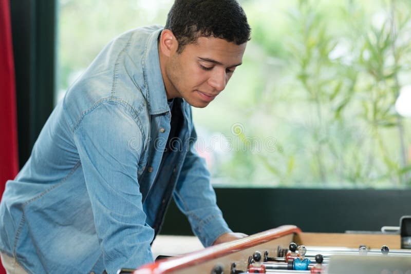 Handsome Man Playing Table Football Stock Photo - Image of football ...