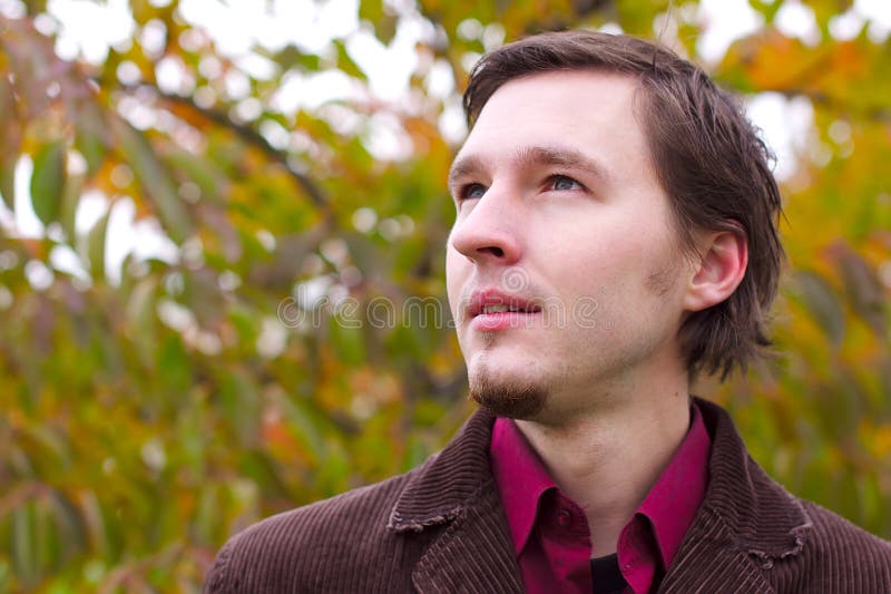 Handsome Man Portrait In Autumn Leaves Background Picture. Image: 21730730