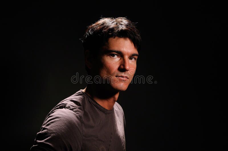 The Handsome Man Poses for the Portrait Stock Photo - Image of hunky ...
