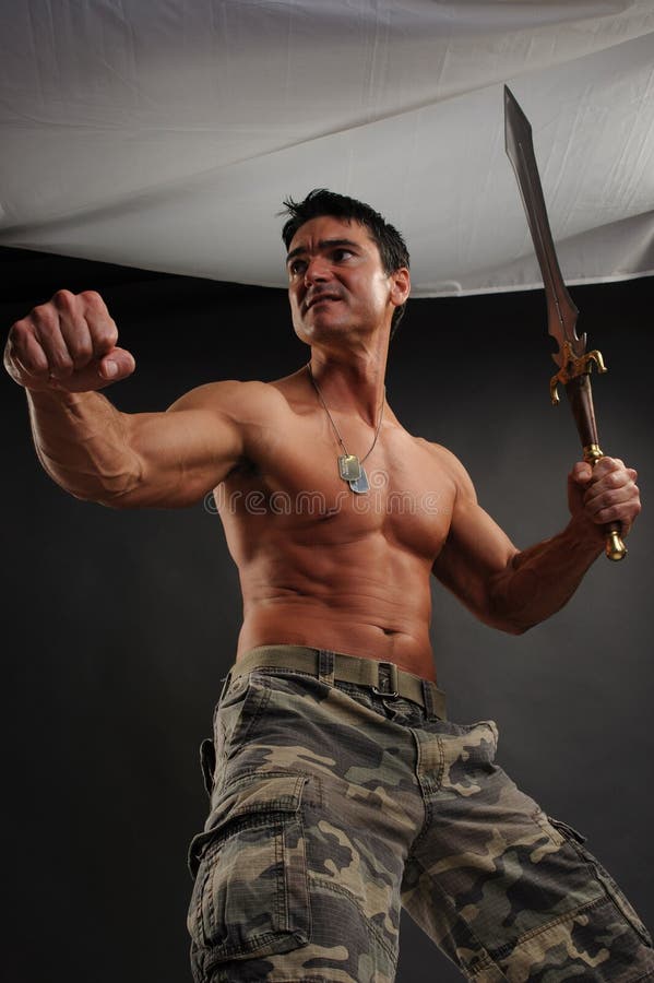 The Handsome Warrior Poses for the Photo. Stock Image - Image of ...