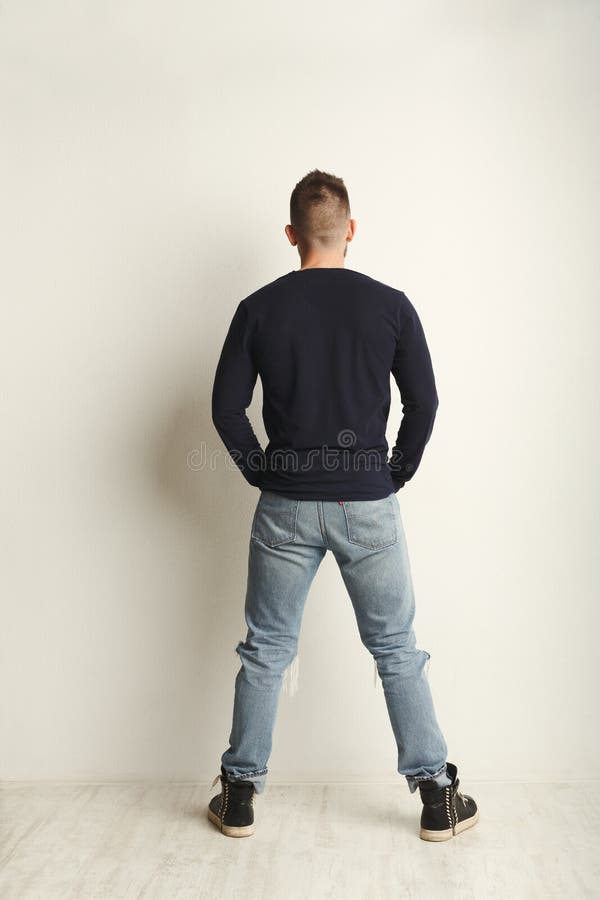 Handsome Man Posing in Studio, Back View Stock Photo - Image of ...