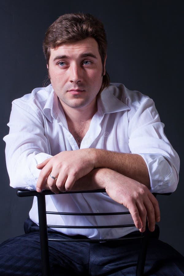 Young man smoking a pipe stock photo. Image of closeup - 29953782