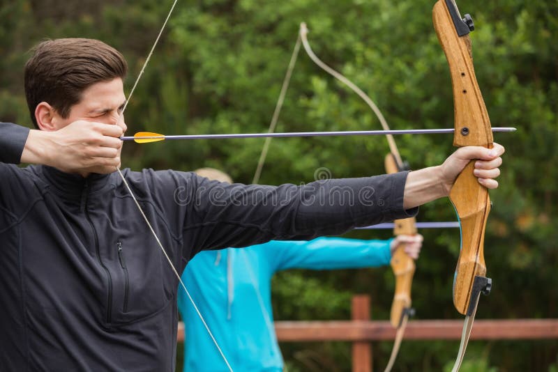 Handsome Man Practicing Archery Stock Image - Image of pulling, archery ...