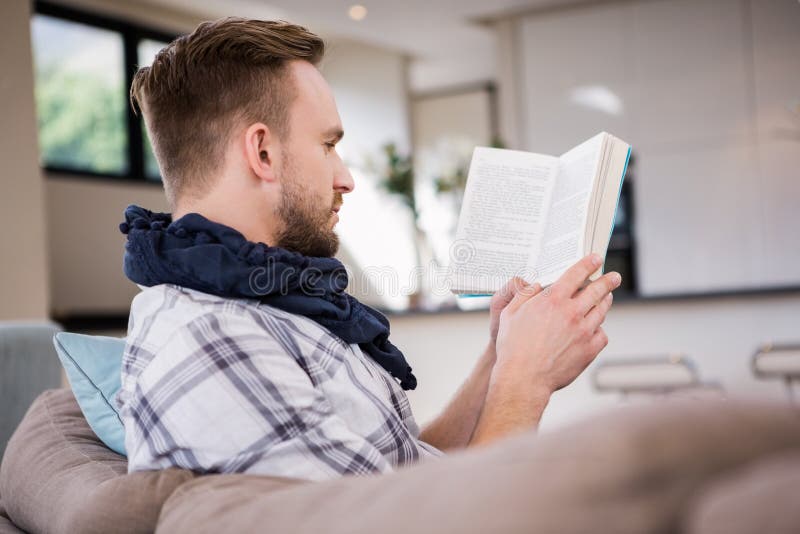 5,741 Man Reading Book Couch Stock Photos - Free & Royalty-Free Stock ...