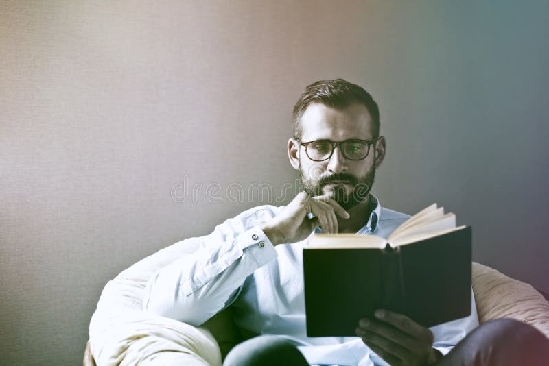 Man Reading Interesting Book Stock Photo - Image of studying, interest ...