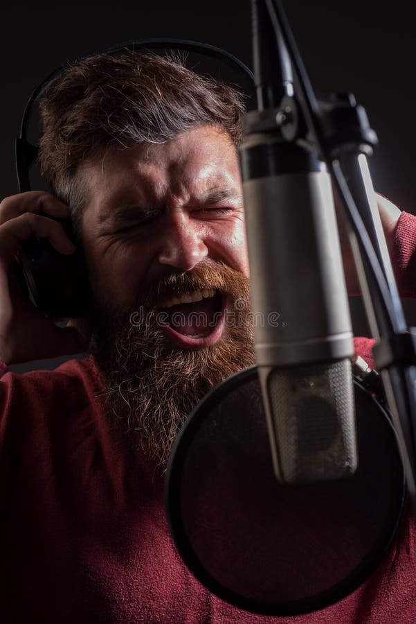 Handsome Man in Recording Studio. Music Performance Vocal. Singer ...