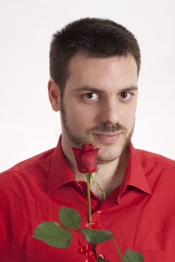 Handsome Man In A Red Shirt With Red Rose Picture. Image: 10033527