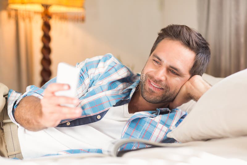 Handsome Man Relaxing on His Bed Stock Photo - Image of indoors, male ...