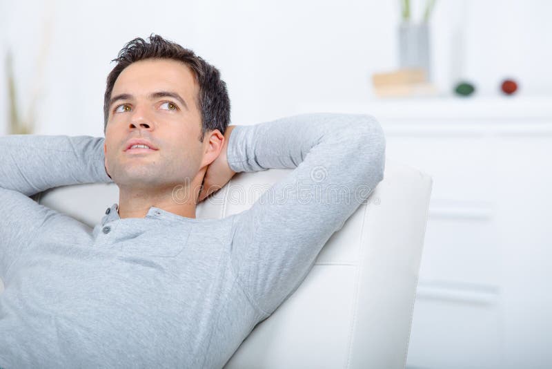 Handsome Man Relaxing at Home Stock Image - Image of flare, chair ...