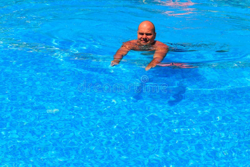 Handsome Man Relaxing in Swimming Pool Stock Photo - Image of resting ...