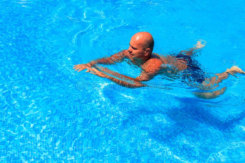 Handsome Man Relaxing in Swimming Pool Stock Image - Image of ...