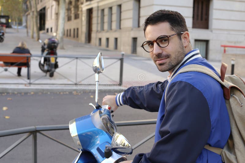 Handsome Man Riding a Scooter Stock Photo - Image of arabic, person ...