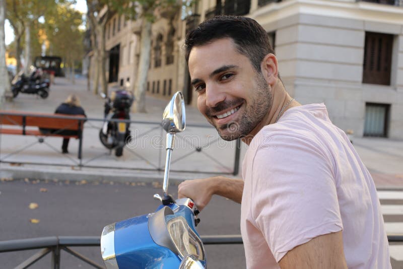 Handsome Man Riding a Scooter Stock Photo - Image of downtown, driving ...