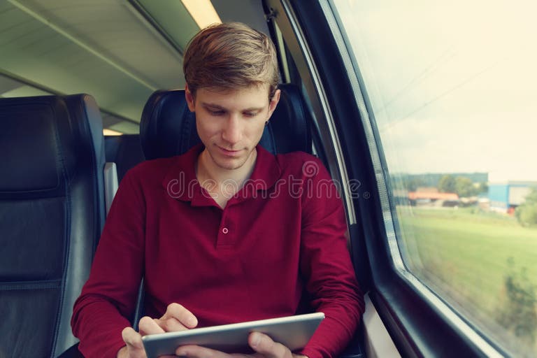 Handsome Man Riding on a Train Stock Image - Image of male, trip: 107891399