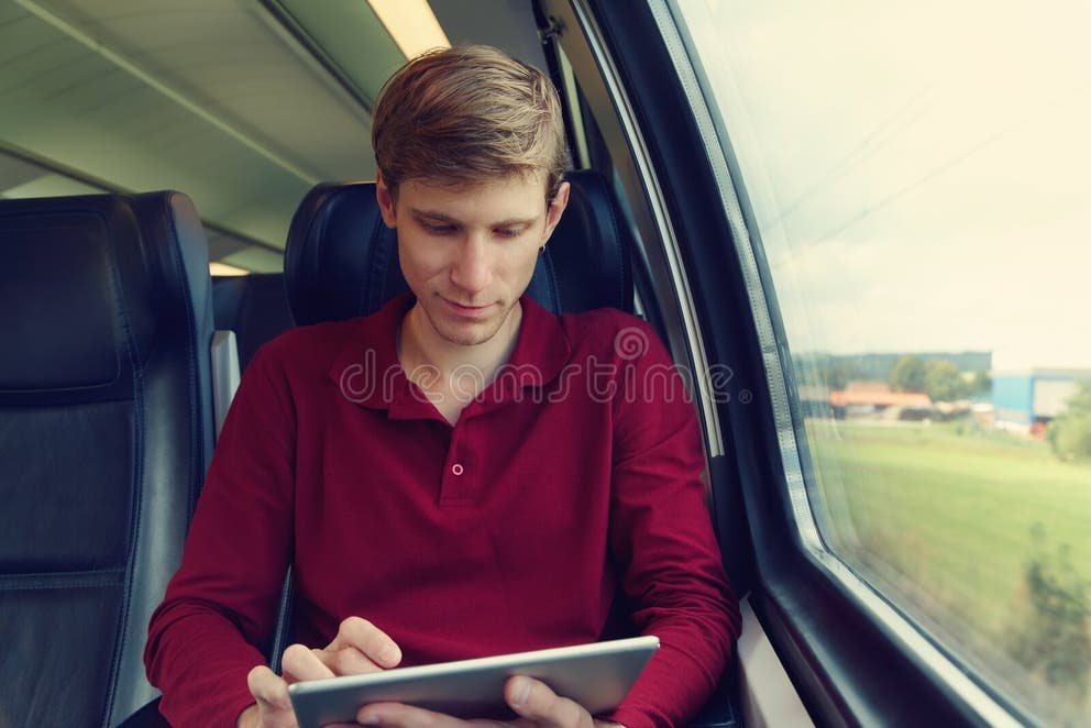Handsome Man Riding on a Train Stock Image - Image of male, trip: 107891399