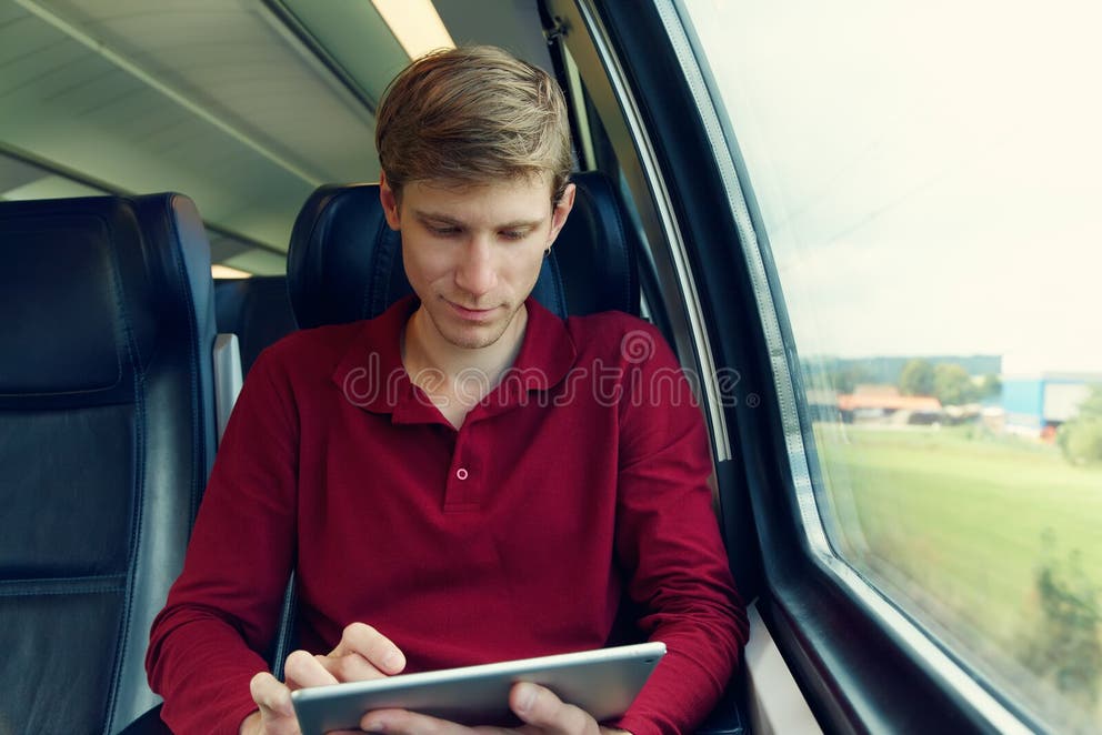 Handsome Man Riding on a Train Stock Image - Image of male, commuting ...