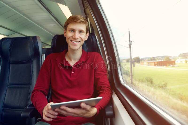 Handsome Man Riding on a Train Stock Image - Image of wagon, traveler ...