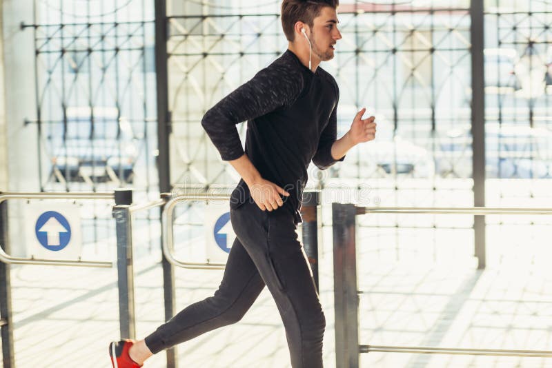 Handsome Man Running in Sunset Near Fence Stock Image - Image of ...