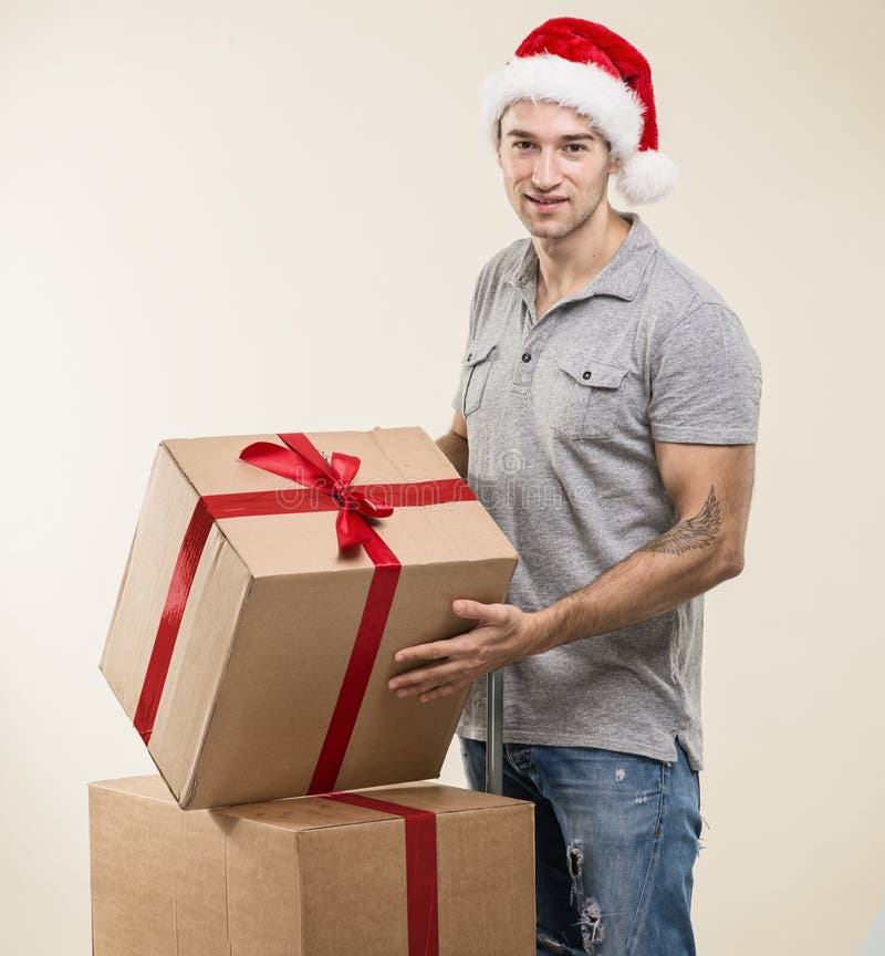 Handsome Man in Santa Hat - Hand Gift Box Stock Photo - Image of ...