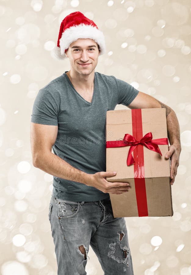 Handsome Man in Santa Hat - Hand Gift Box Stock Photo - Image of male ...