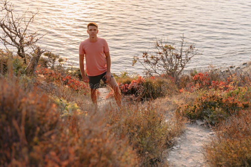 Handsome Man on the Sea Coastline with Warm Sun Light Stock Photo ...