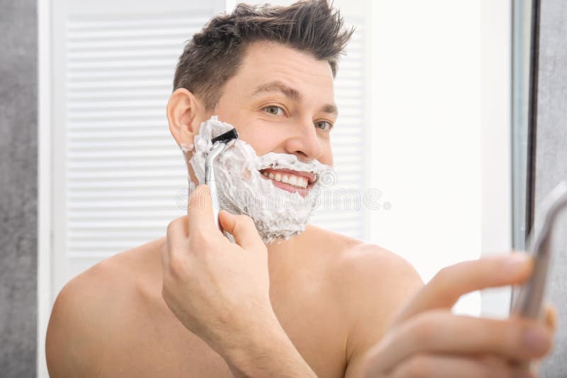 Handsome man shaving stock image. Image of lifestyle - 111838887