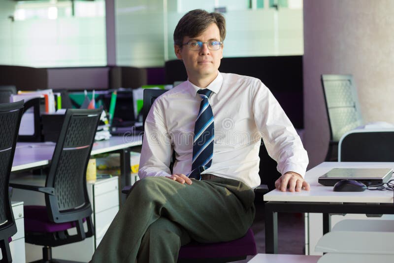 Handsome Man in Shirt and Tie Sits at Table with Stock Photo - Image of ...