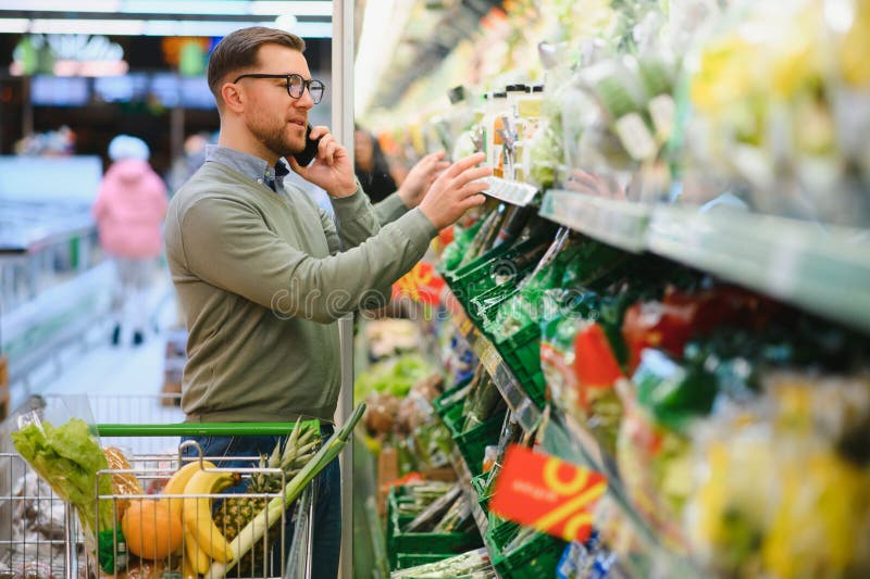 Handsome Man Shopping in a Supermarket Stock Photo - Image of lifestyle ...
