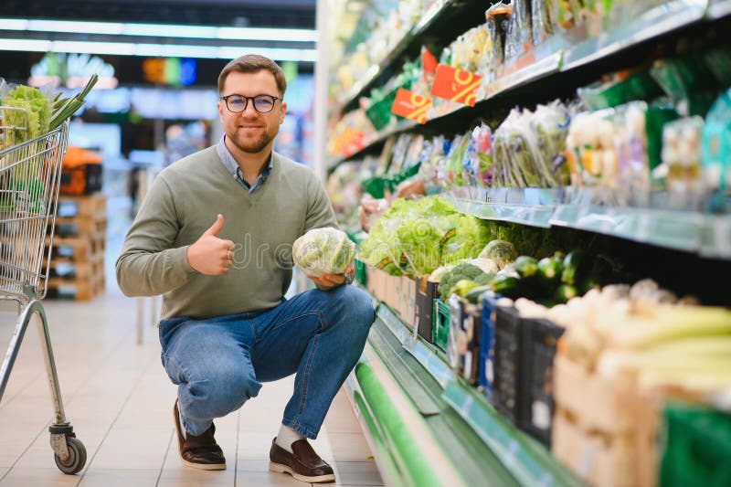 Handsome Man Shopping in a Supermarket Stock Image - Image of ...
