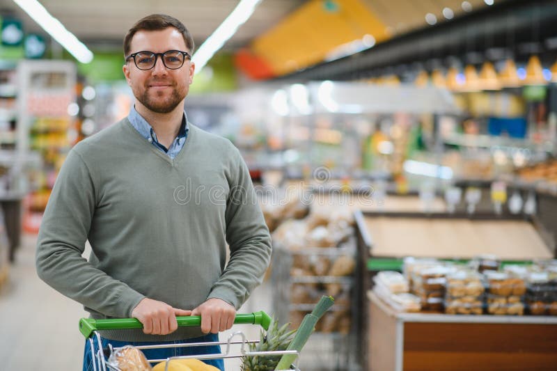 Handsome Man Shopping in a Supermarket Stock Image - Image of fruit ...